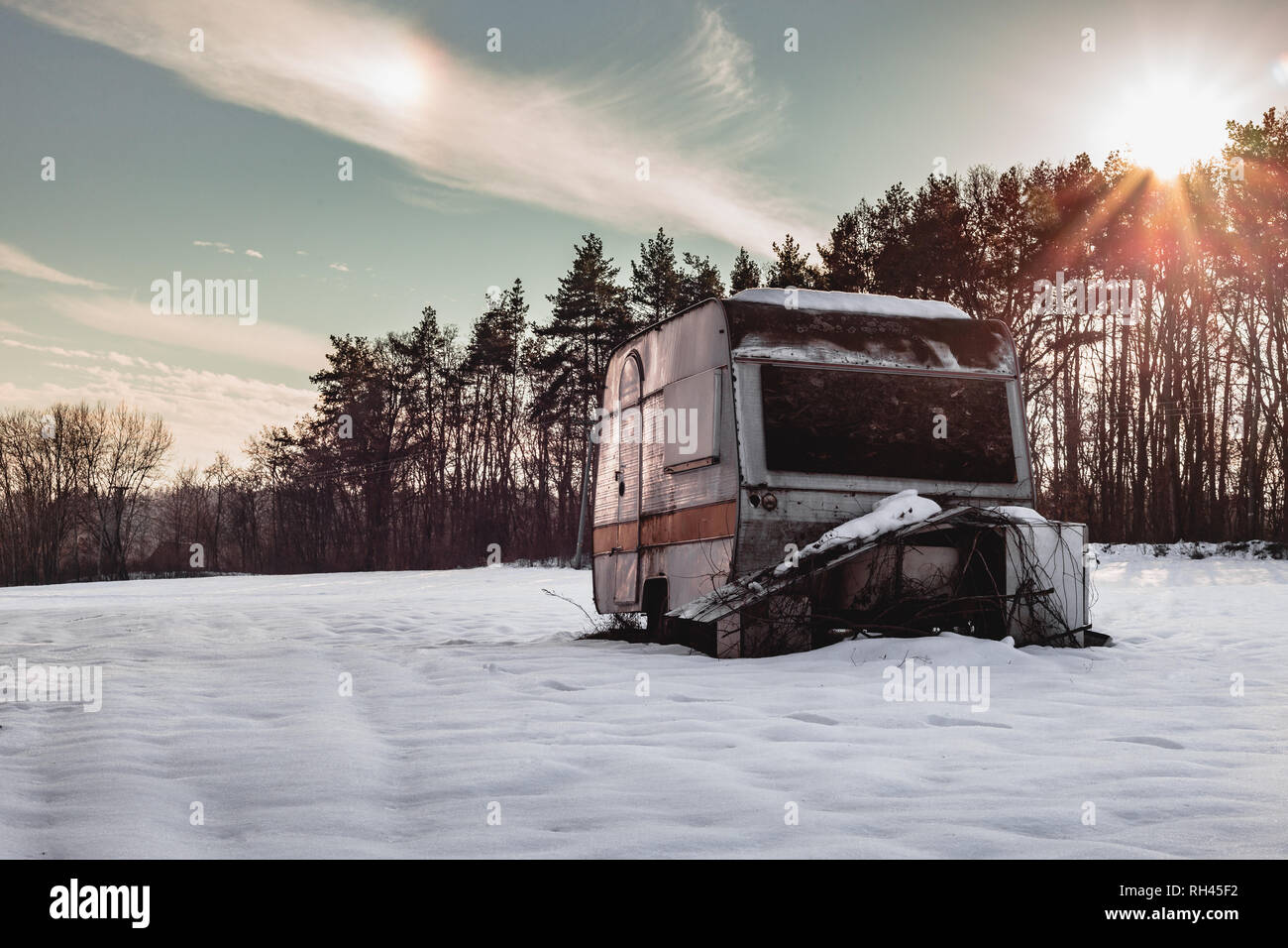 Beautiful photo of old and abandoned caravan in the middle of snow ...