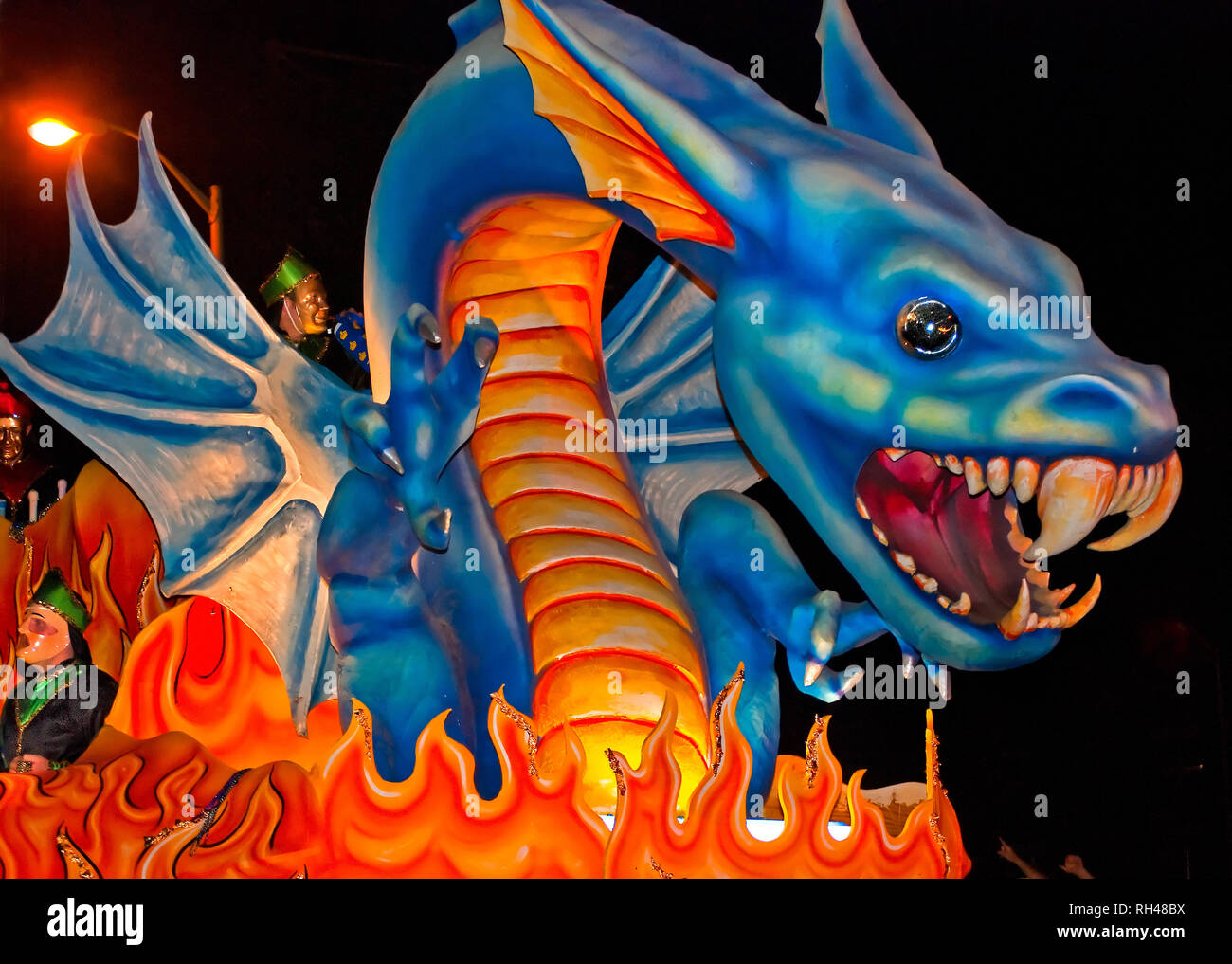 A dragon towers over a float during the Order of Inca Mardi Gras parade ...