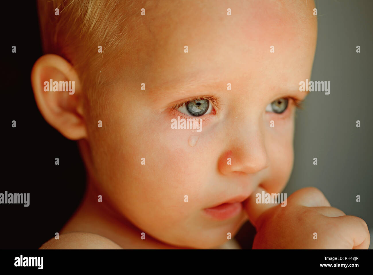 Bitter tears. Little baby crying. He is a cry baby. Baby with tear ...