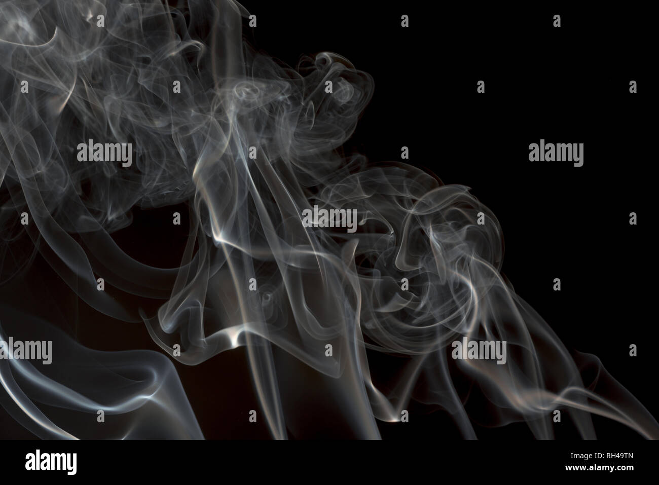 Smoke on a black background. Smoke movement patterns of background ...