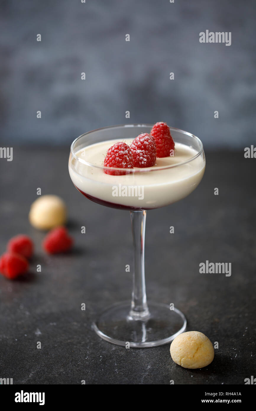 Layered panna cotta with raspberry, vanilla and amaretto biscuit Stock ...