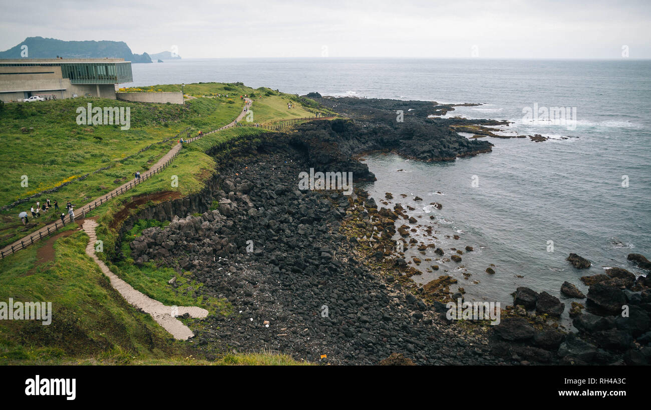 Volcanic rock beaches on the coast of Jeju Island, Seogwipo area Stock ...