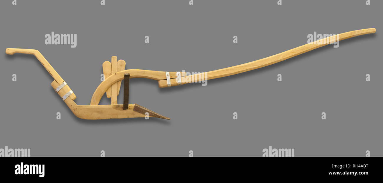 Ancient roman plow or aratrum. Scale model reconstruction. Isolated ...