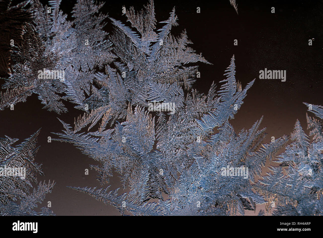Ice crystalized frost on winter window Stock Photo - Alamy