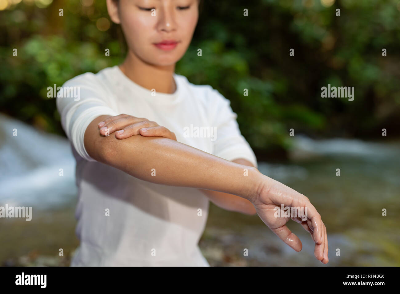 Mosquito repellent. Women are using insect repellent cream in the ...