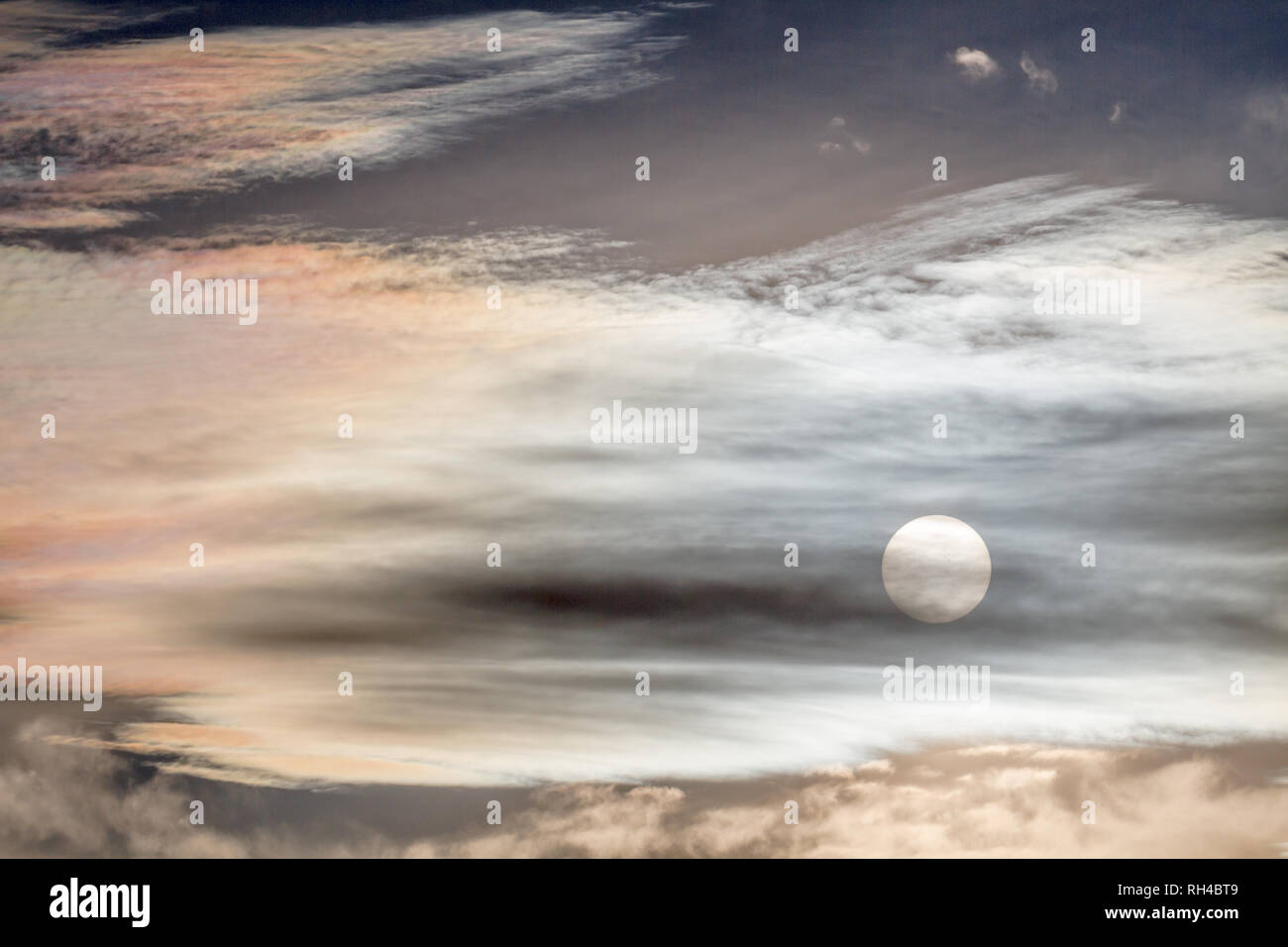 Abstract, surreal image of interesting daytime sky with clouds, sun and ...