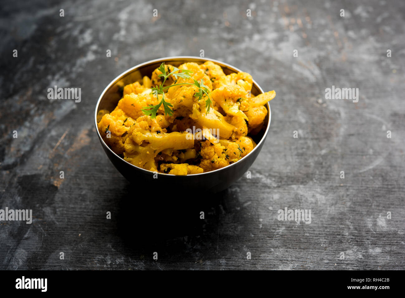 Dry Gobi Masala/ cauliflower Sabzi served in a bowl. selective focus ...