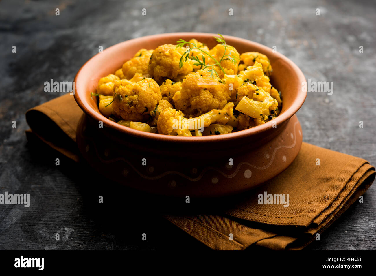 Dry Gobi Masala/ cauliflower Sabzi served in a bowl. selective focus ...