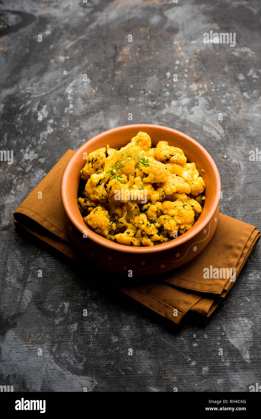 Dry Gobi Masala/ cauliflower Sabzi served in a bowl. selective focus ...