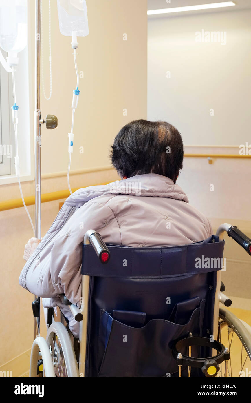 Senior or elderly woman patient on wheelchair so sad in hospital ...