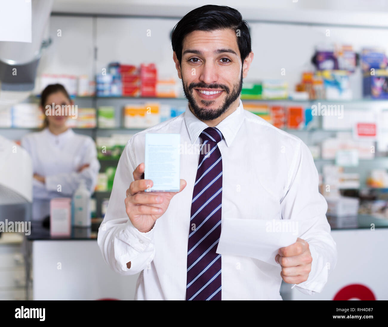 Portrait of happy man client who is satisfied of recommended medicines ...