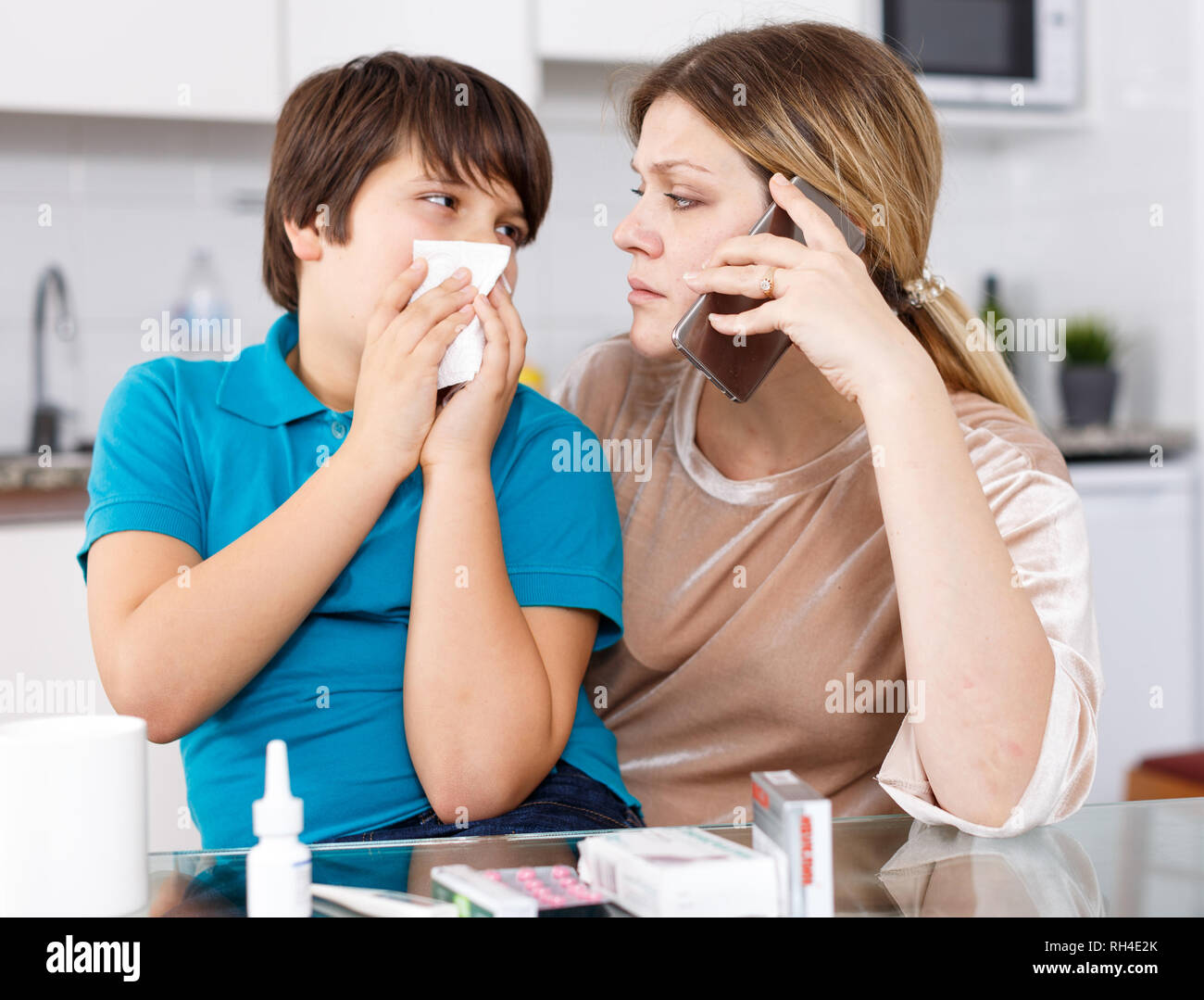 Anxious mother phone hi-res stock photography and images - Alamy