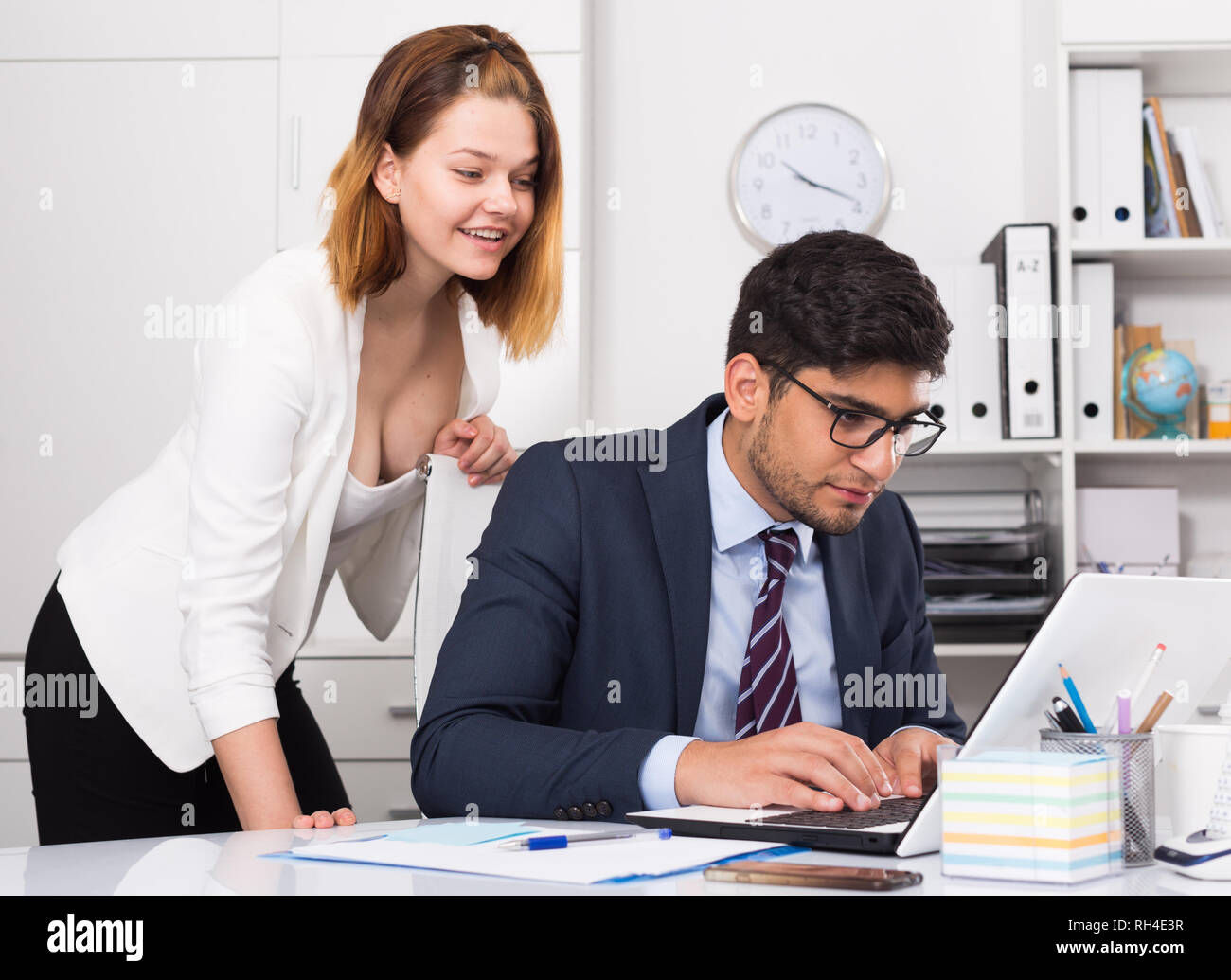 Focused business team working with computer in modern office Stock ...