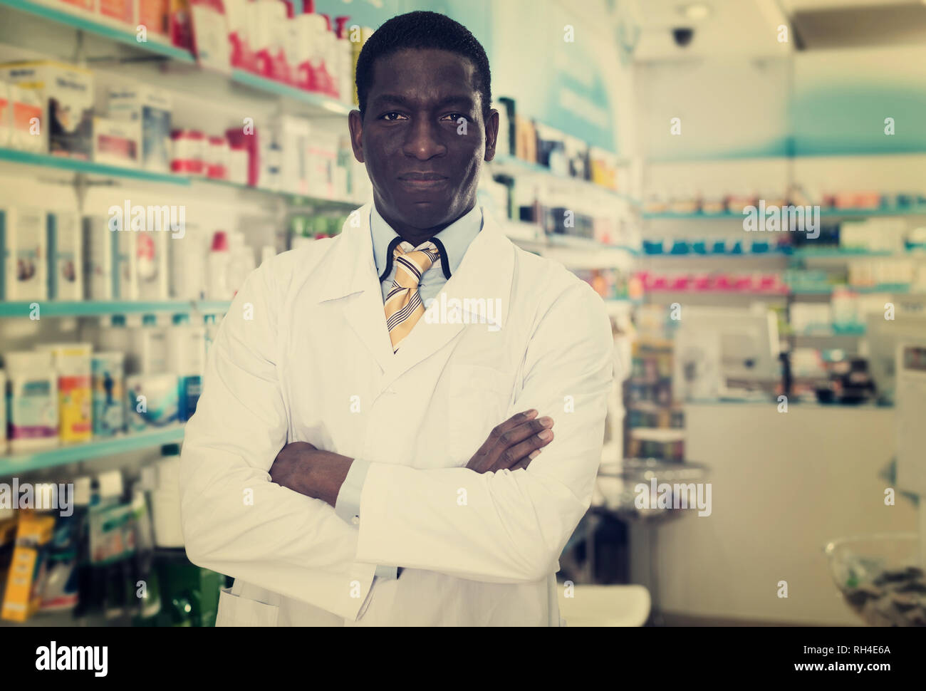 Portrait of African American male pharmacist in modern drugstore Stock ...