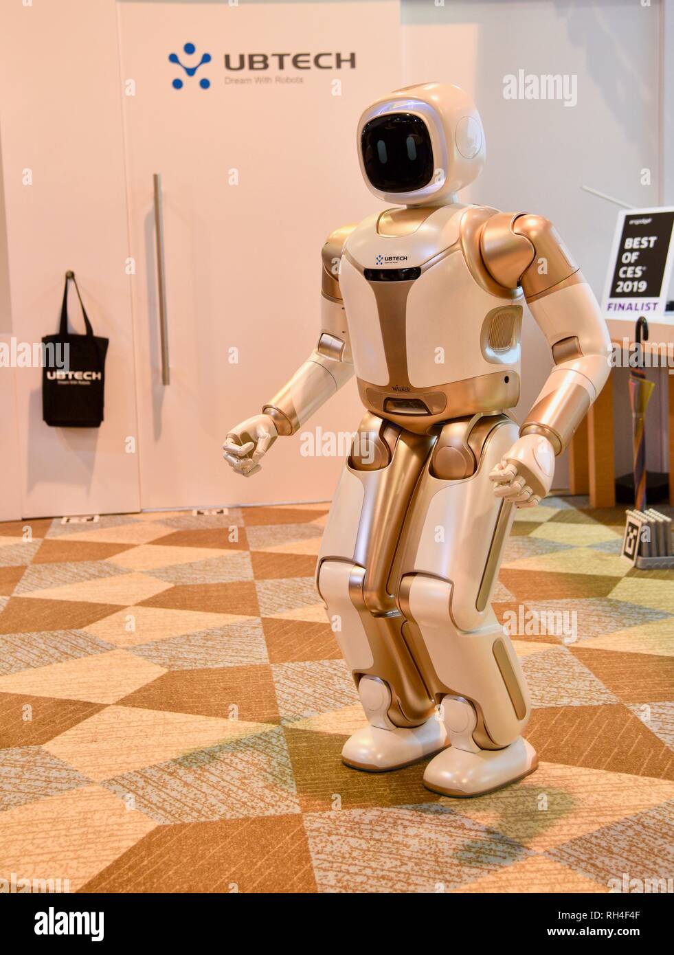 Ubtech's humanoid robot, Walker, demonstrates robotic skills at exhibit ...