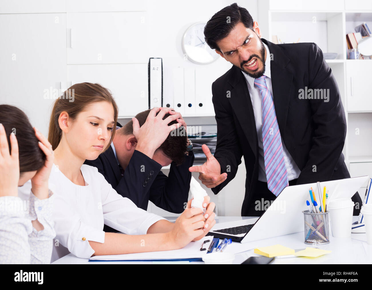 Outraged manager expressing dissatisfaction with teamwork of colleagues ...