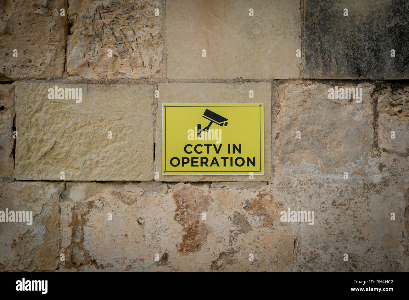 CCTV in operation sign on a exterior wall Stock Photo - Alamy