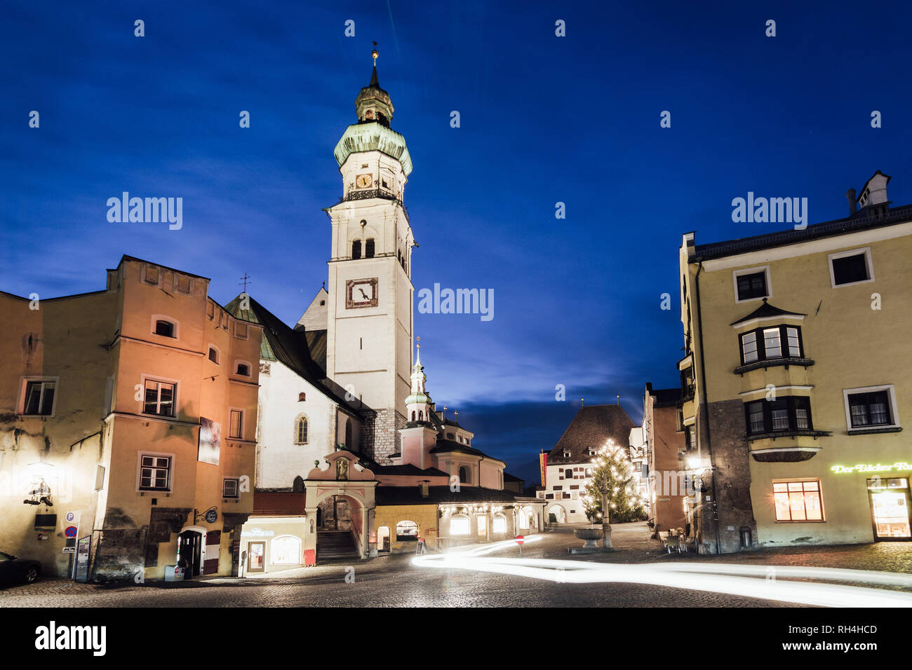 HALL IN TIROL, AUSTRIA - DECEMBER 2018: night view of the town old ...