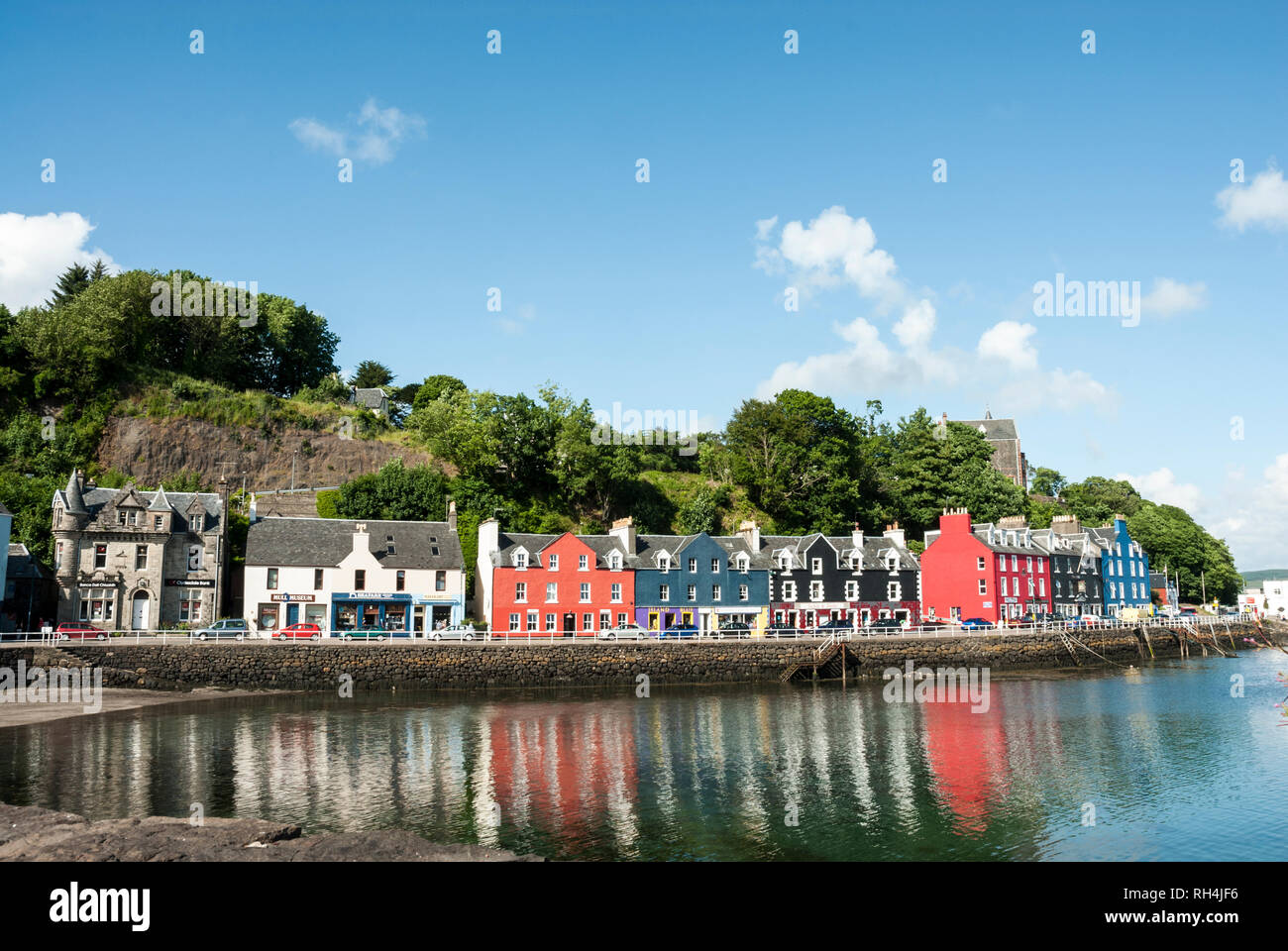 Colourful painted houses along the harbour front at Tobermory, Mull, UK ...