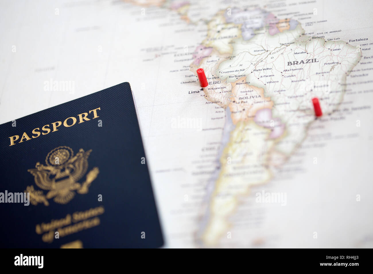 Passport on the world map Stock Photo - Alamy