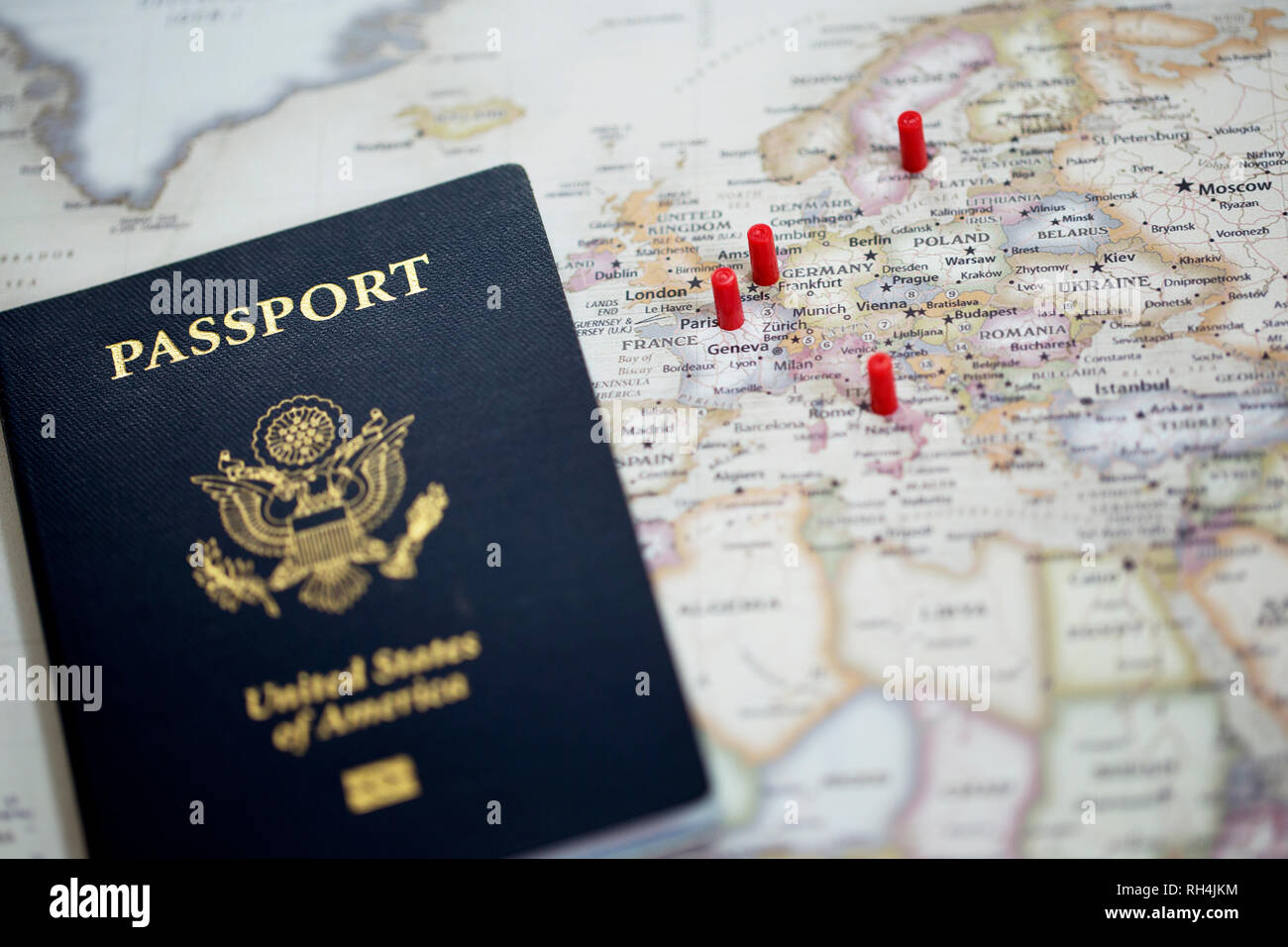 Passport on the world map Stock Photo - Alamy