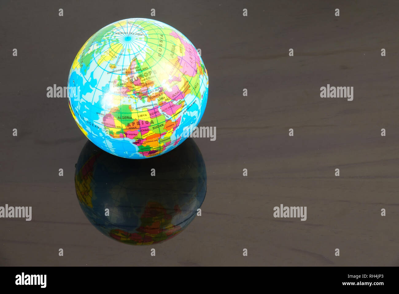 World globe with reflection. Globalization Concept Stock Photo - Alamy