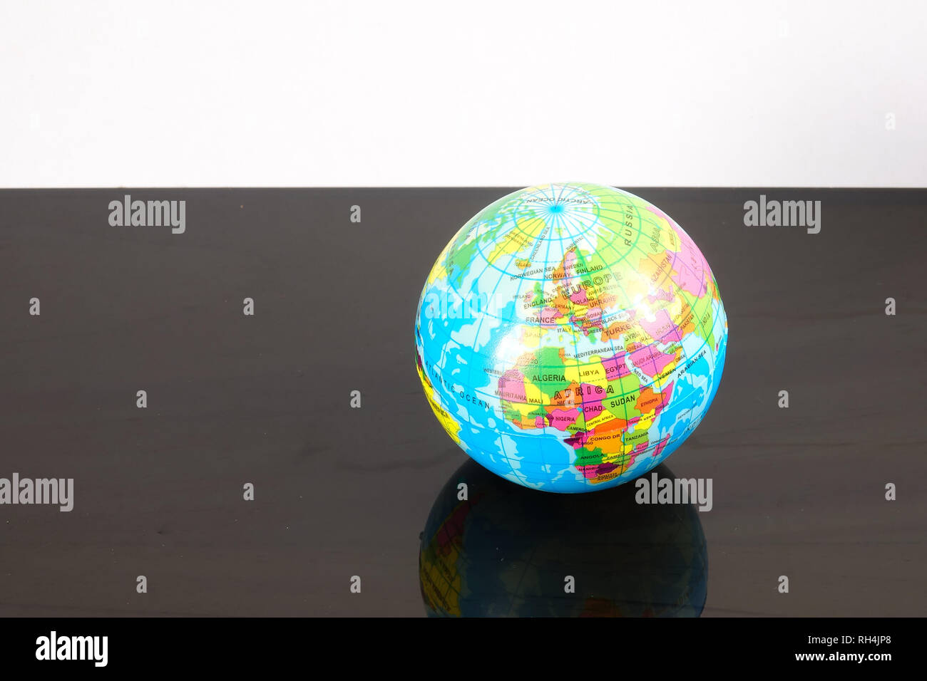 World globe with reflection. Globalization Concept Stock Photo - Alamy