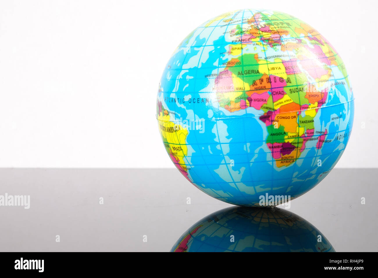 World globe with reflection. Globalization Concept Stock Photo - Alamy