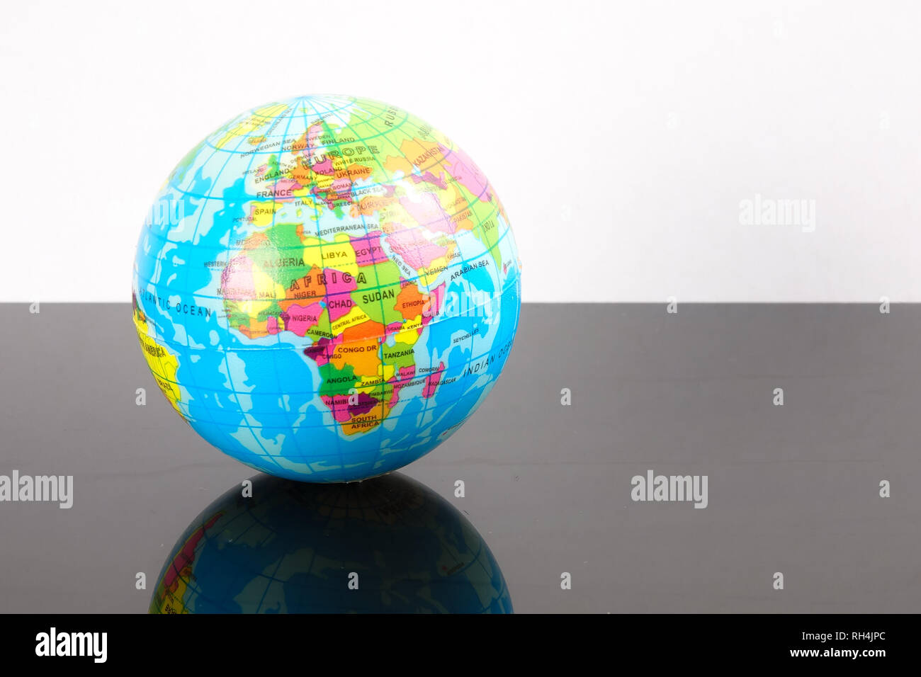 World globe with reflection. Globalization Concept Stock Photo - Alamy