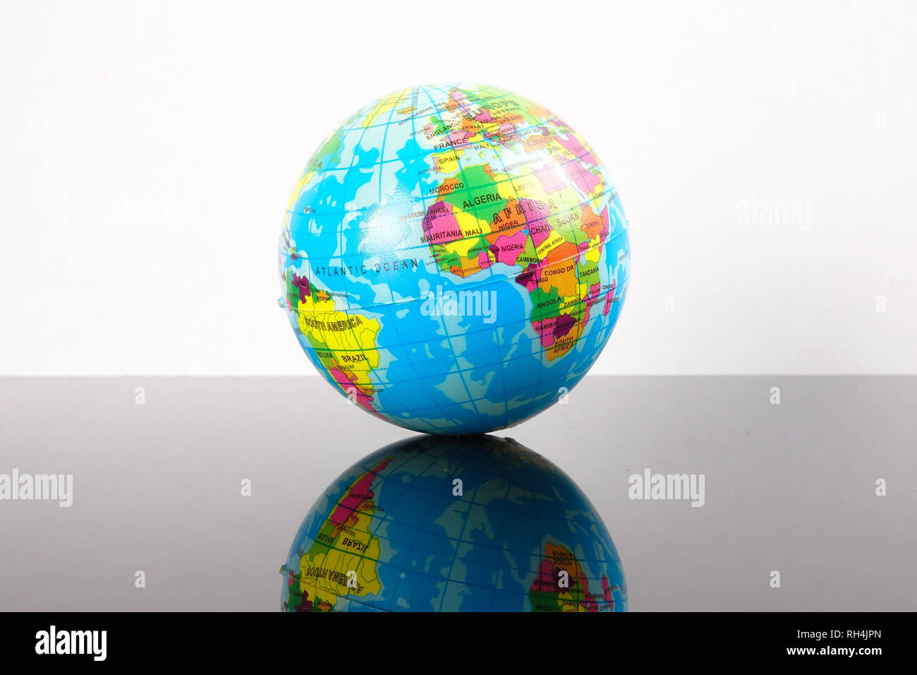 World globe with reflection. Globalization Concept Stock Photo - Alamy