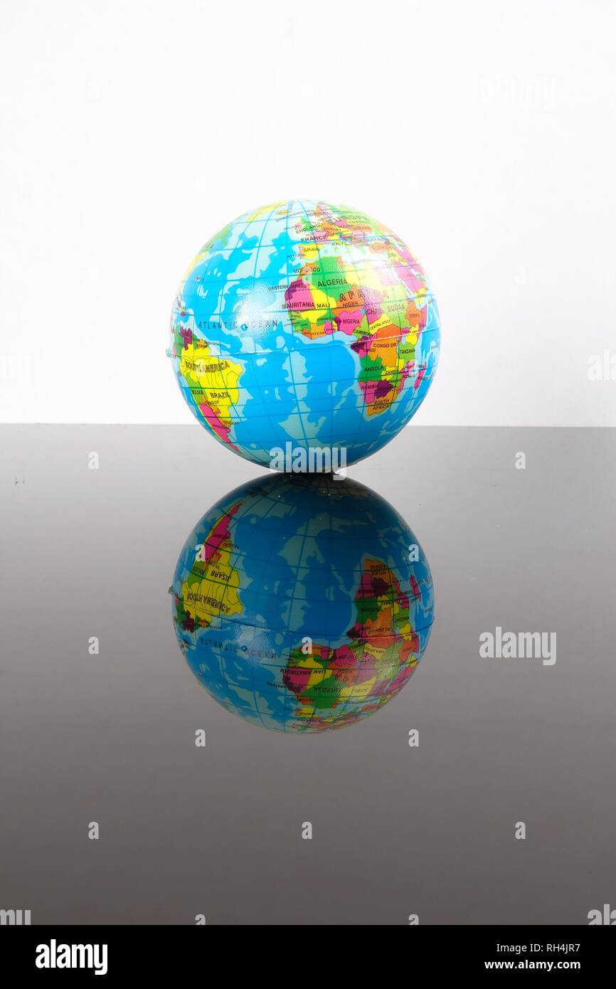 World globe with reflection. Globalization Concept Stock Photo - Alamy