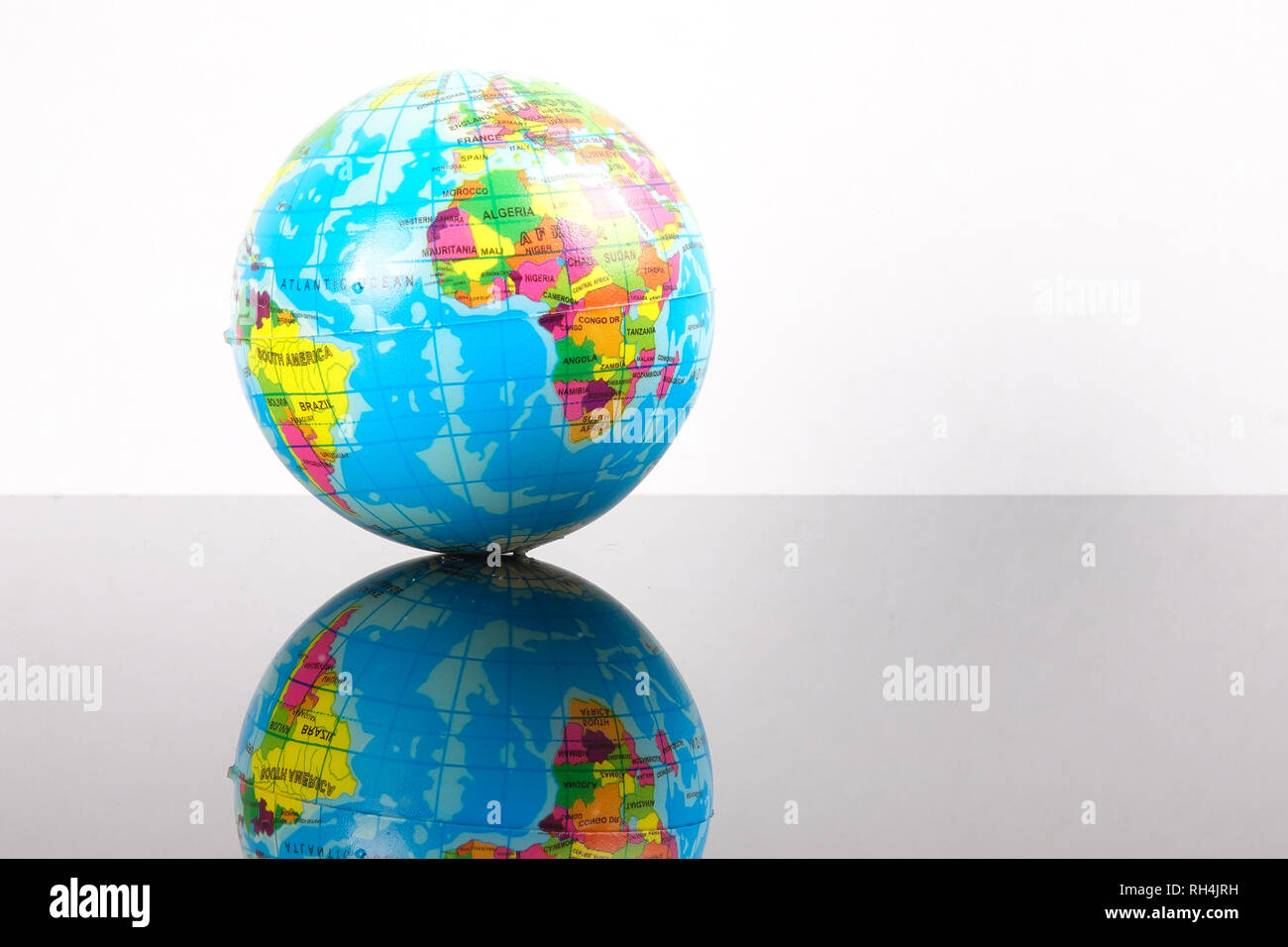 World globe with reflection. Globalization Concept Stock Photo - Alamy