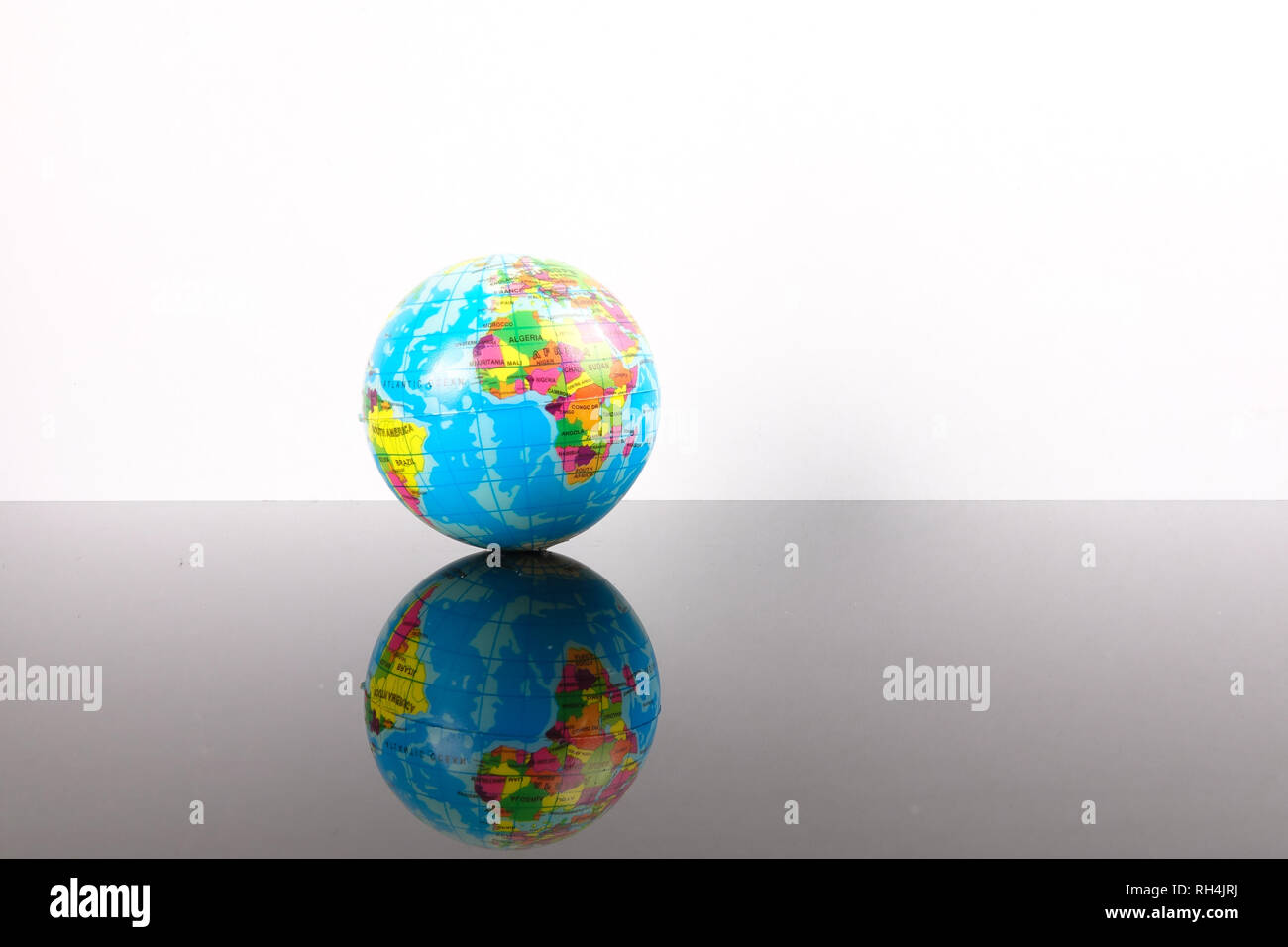 World globe with reflection. Globalization Concept Stock Photo - Alamy