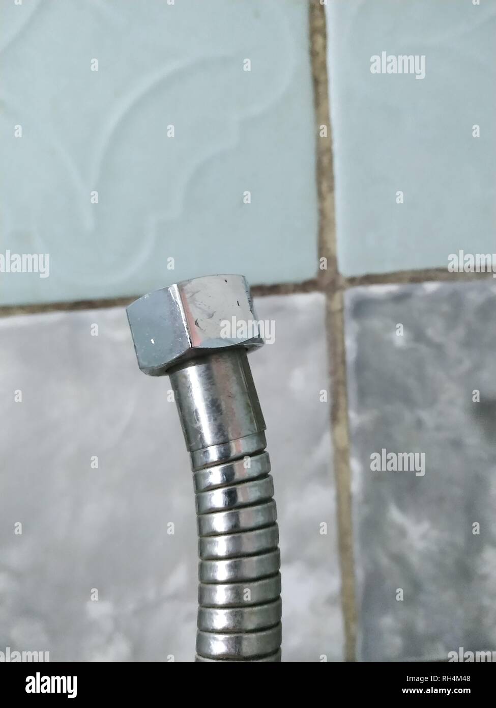 Close up Shower hose. Chrome pipe connection Stock Photo - Alamy