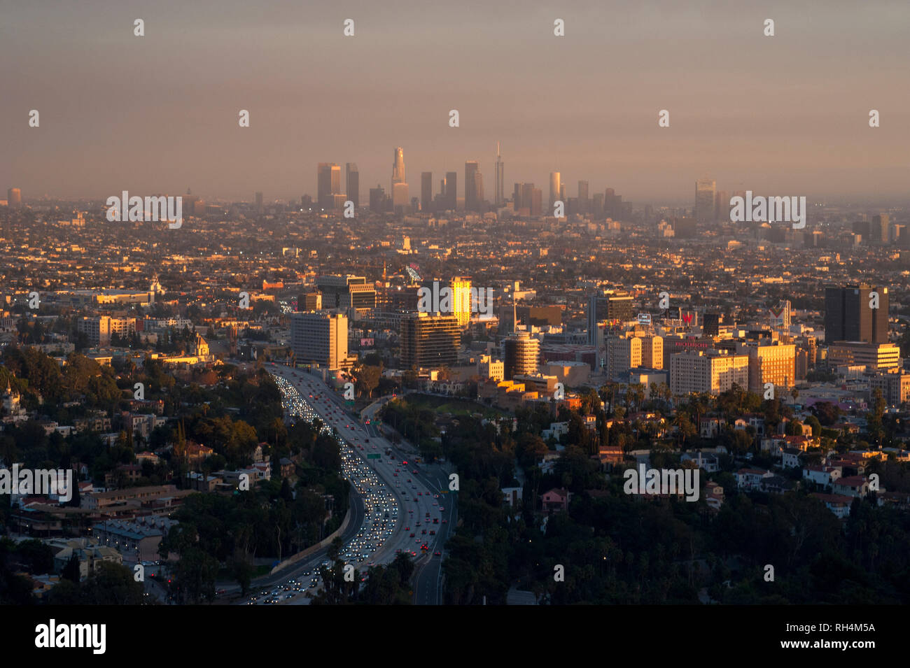 View of Hollywood with downtown Los Angeles in distance through smoggy ...