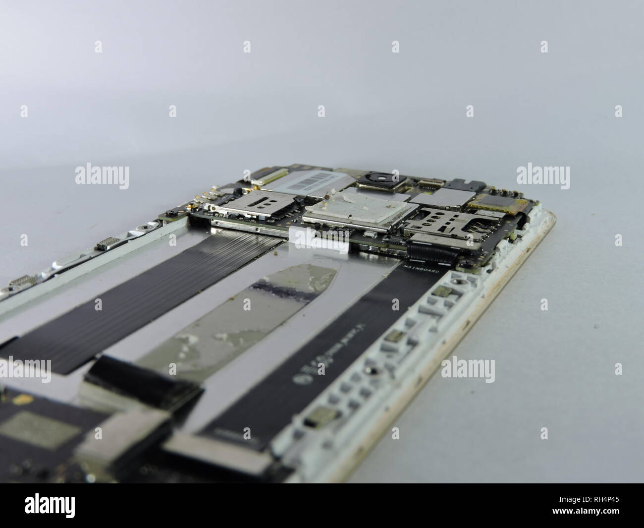 Open mobile phone showing screen and motherboard chipset Stock Photo ...