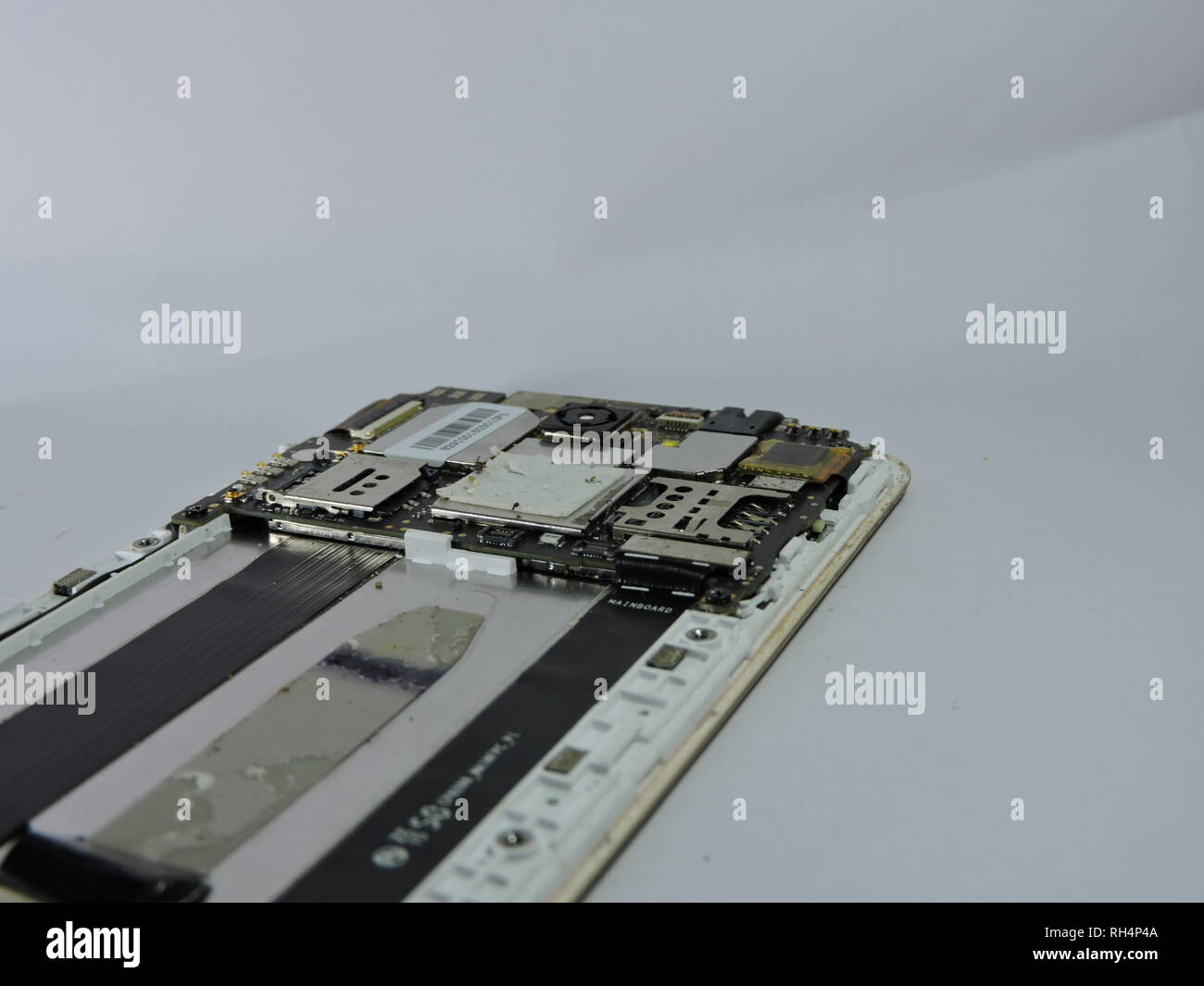 Open mobile phone showing screen and motherboard chipset Stock Photo ...
