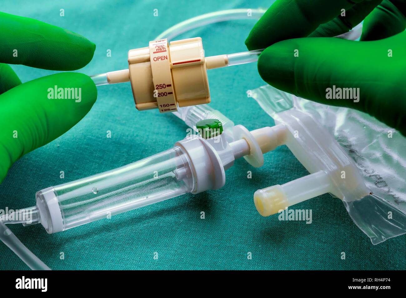 Doctor holds a flow dial on a hospital table, conceptual image Stock ...