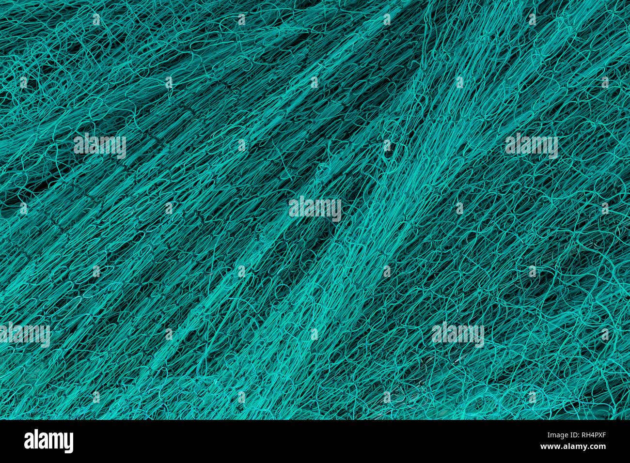 Background with blue fishing net. Grid texture Stock Photo - Alamy