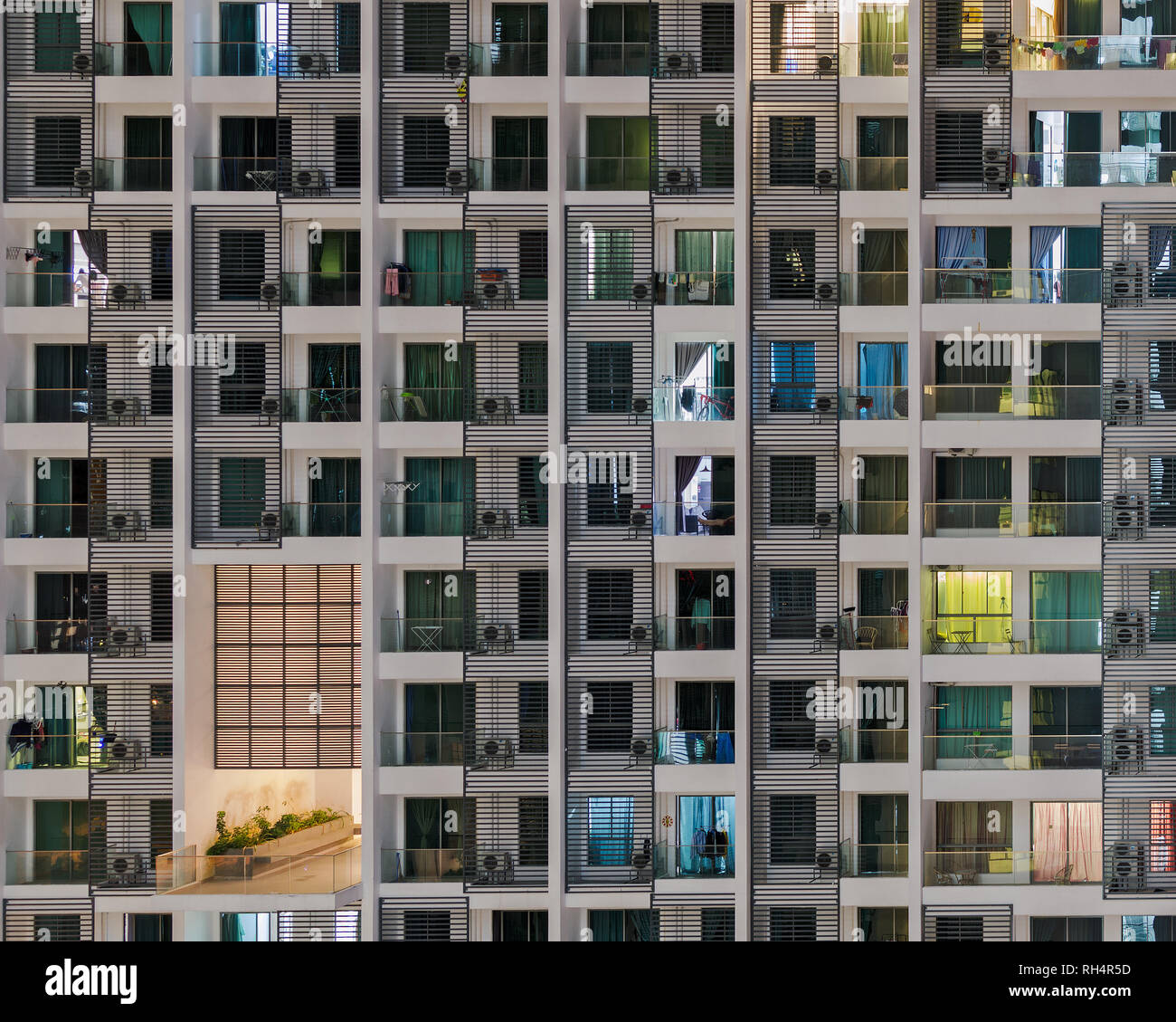 Windows at night. Sleeping building. Frontal view of facade of ...