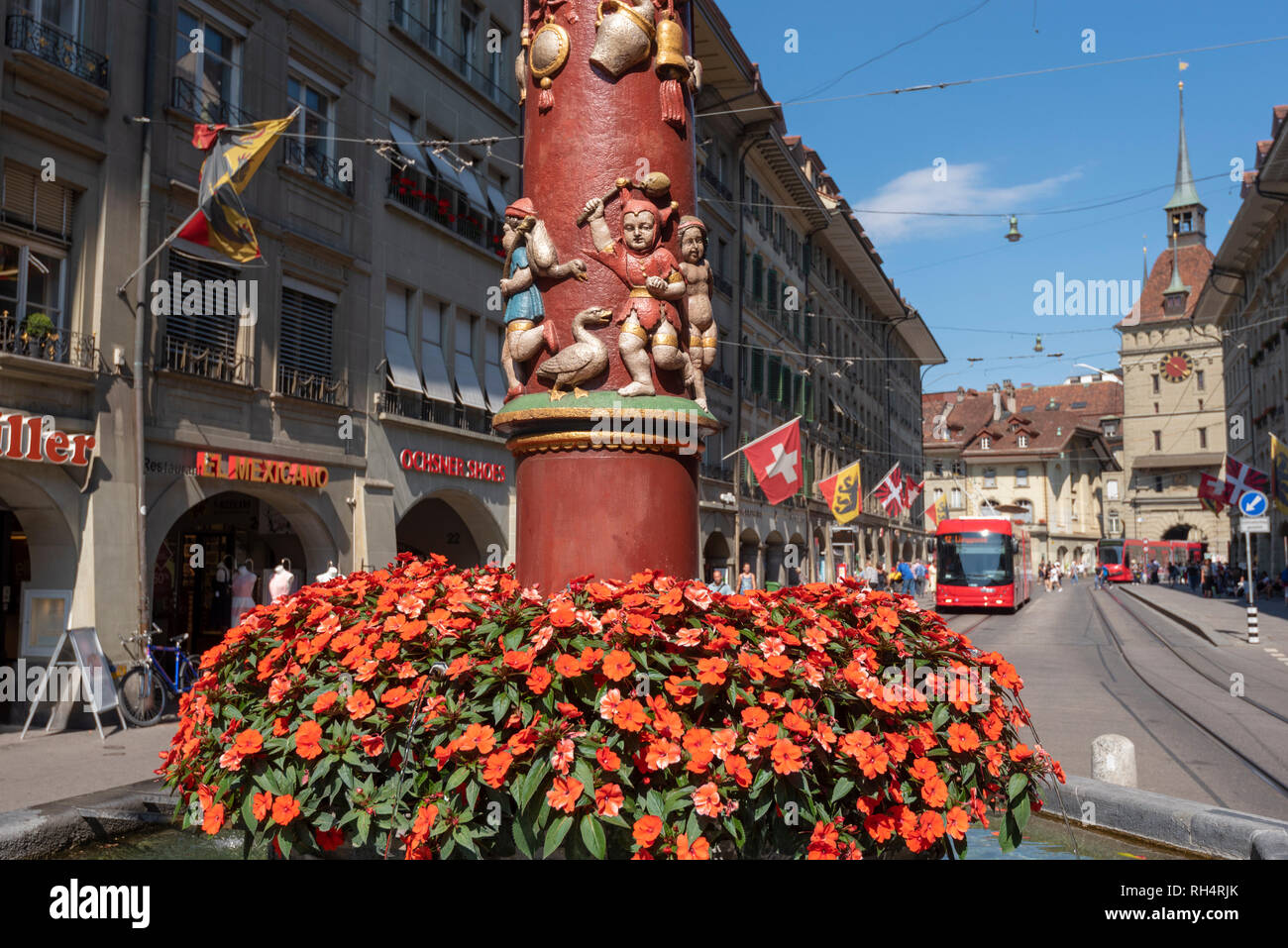 detail of colorful pillar and character adorning the medieval ...