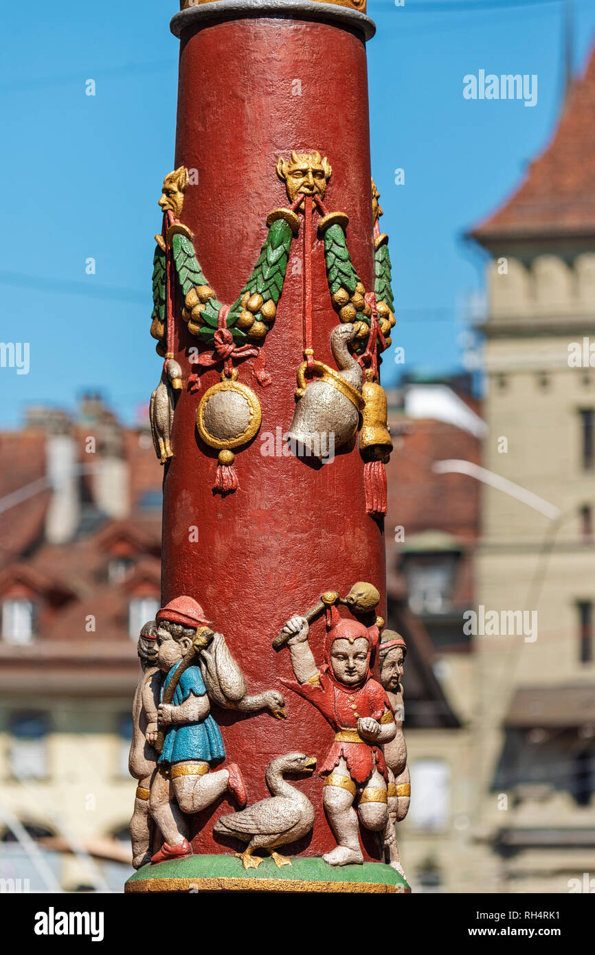 detail of colorful pillar and character adorning the medieval ...
