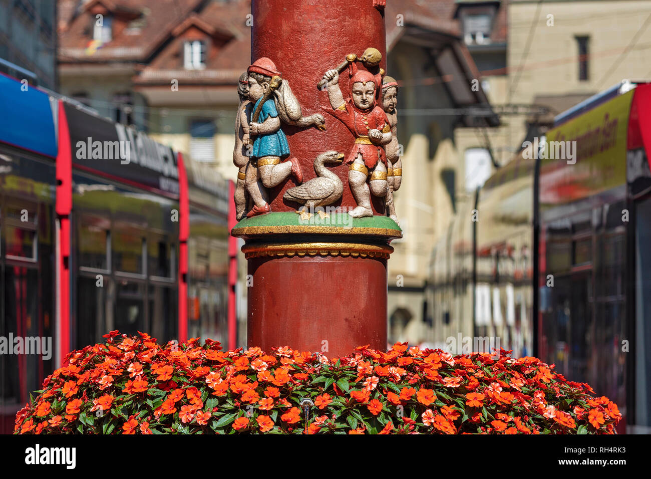 detail of colorful pillar and character adorning the medieval ...