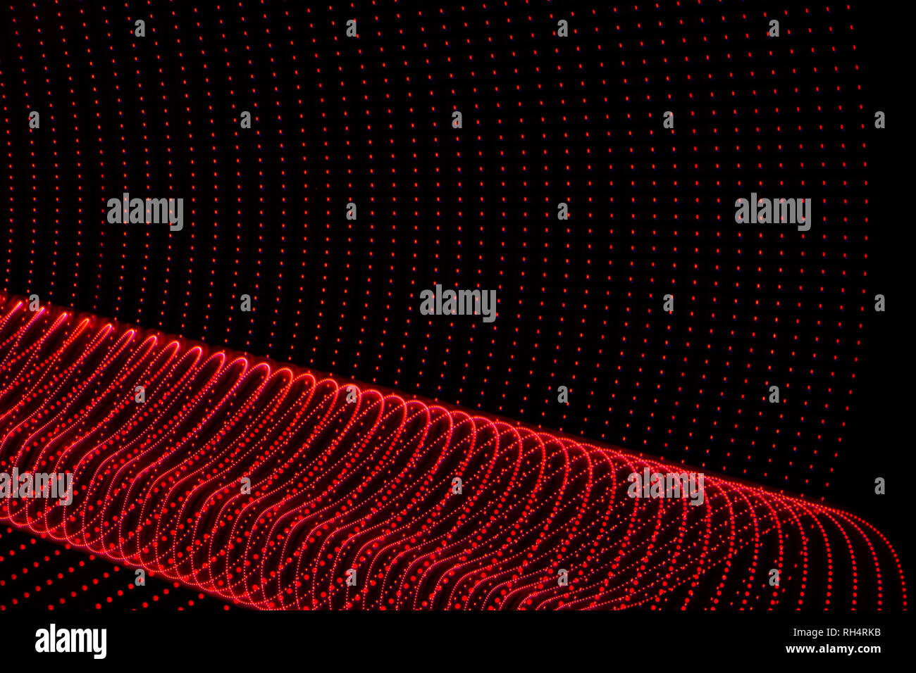 Several red dotted lines with abstract shapes. Light painting ...