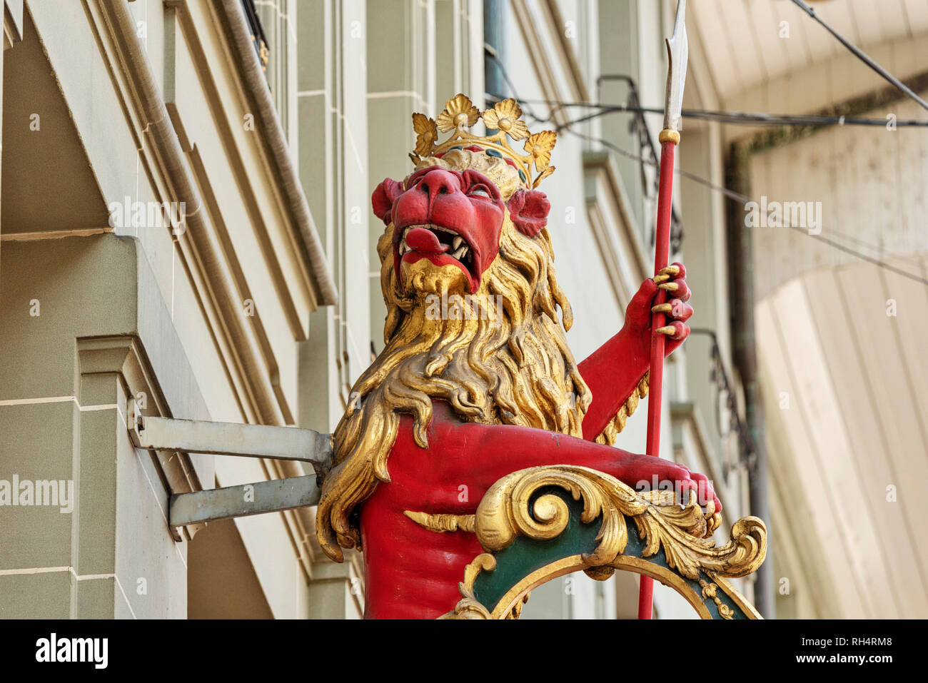 figure of a lion crowned on a wall in the old town of Bern, Switzerland ...