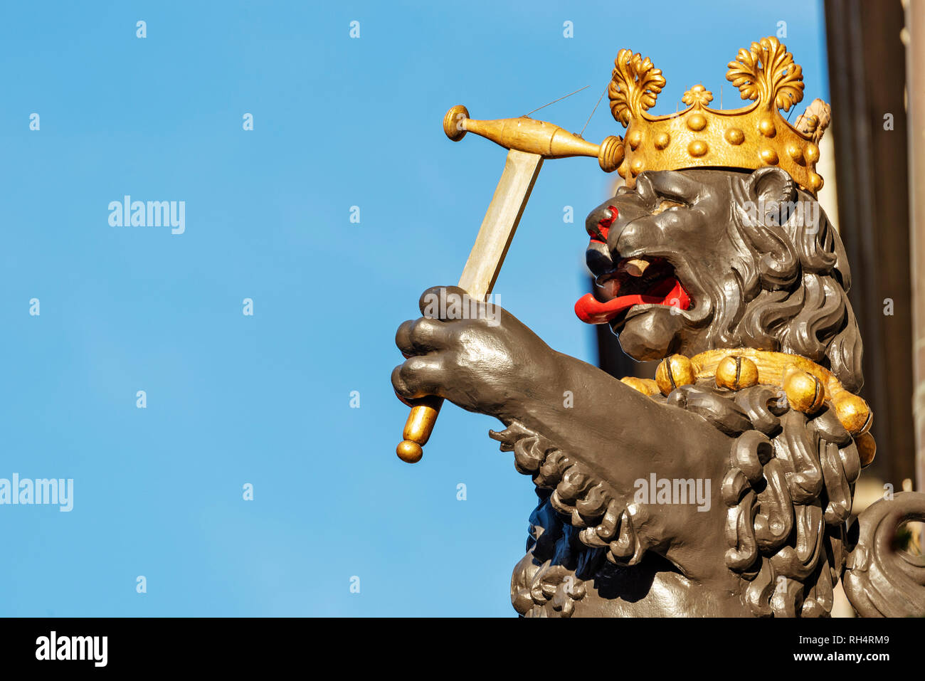 figure of a lion crowned on a wall in the old town of Bern, Switzerland ...