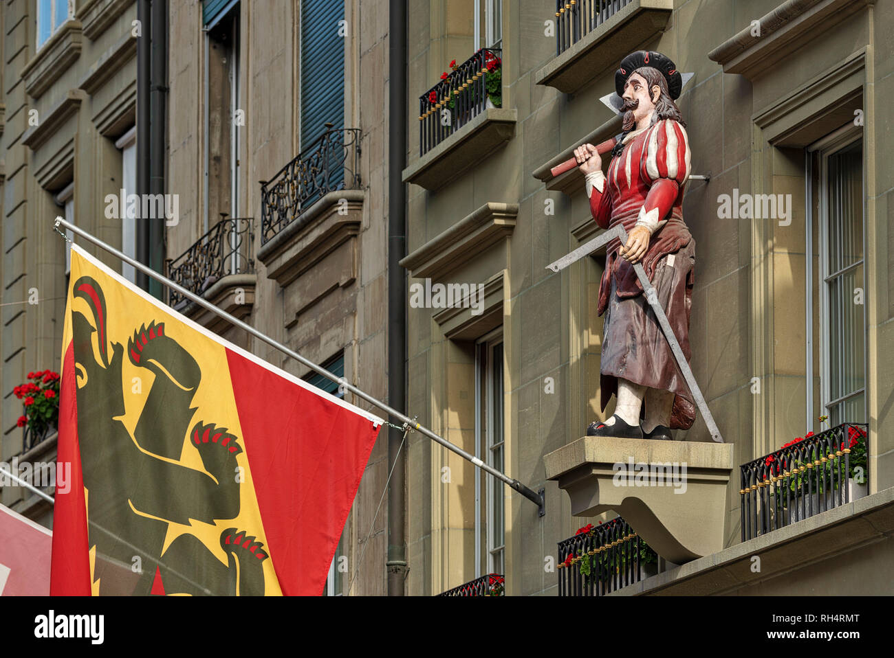 The statue of the butcher decorates frontage of a building in the old ...