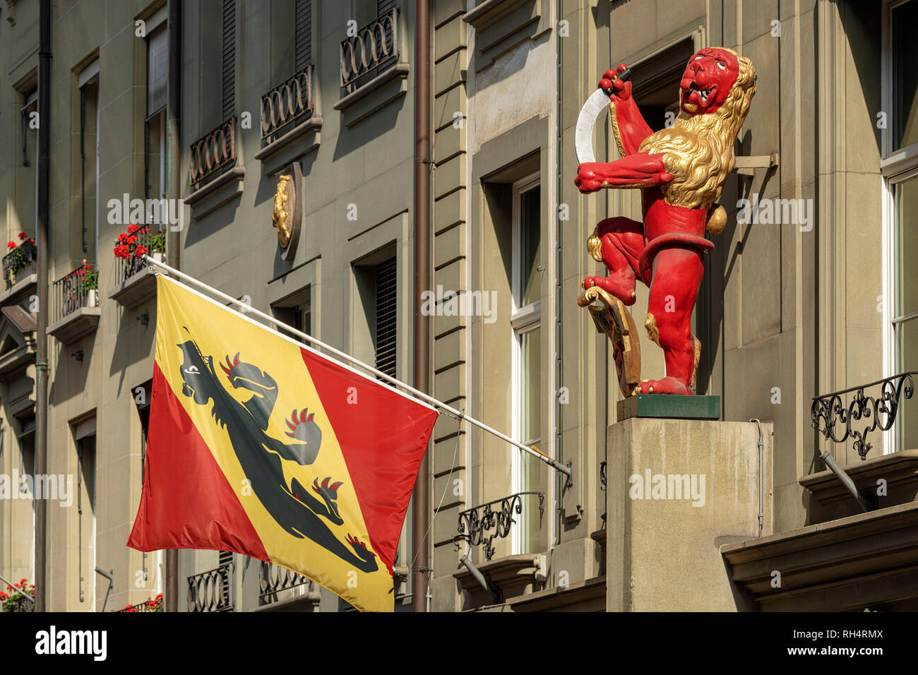figure of a lion with a knife on a wall in Bern, Switzerland Stock ...