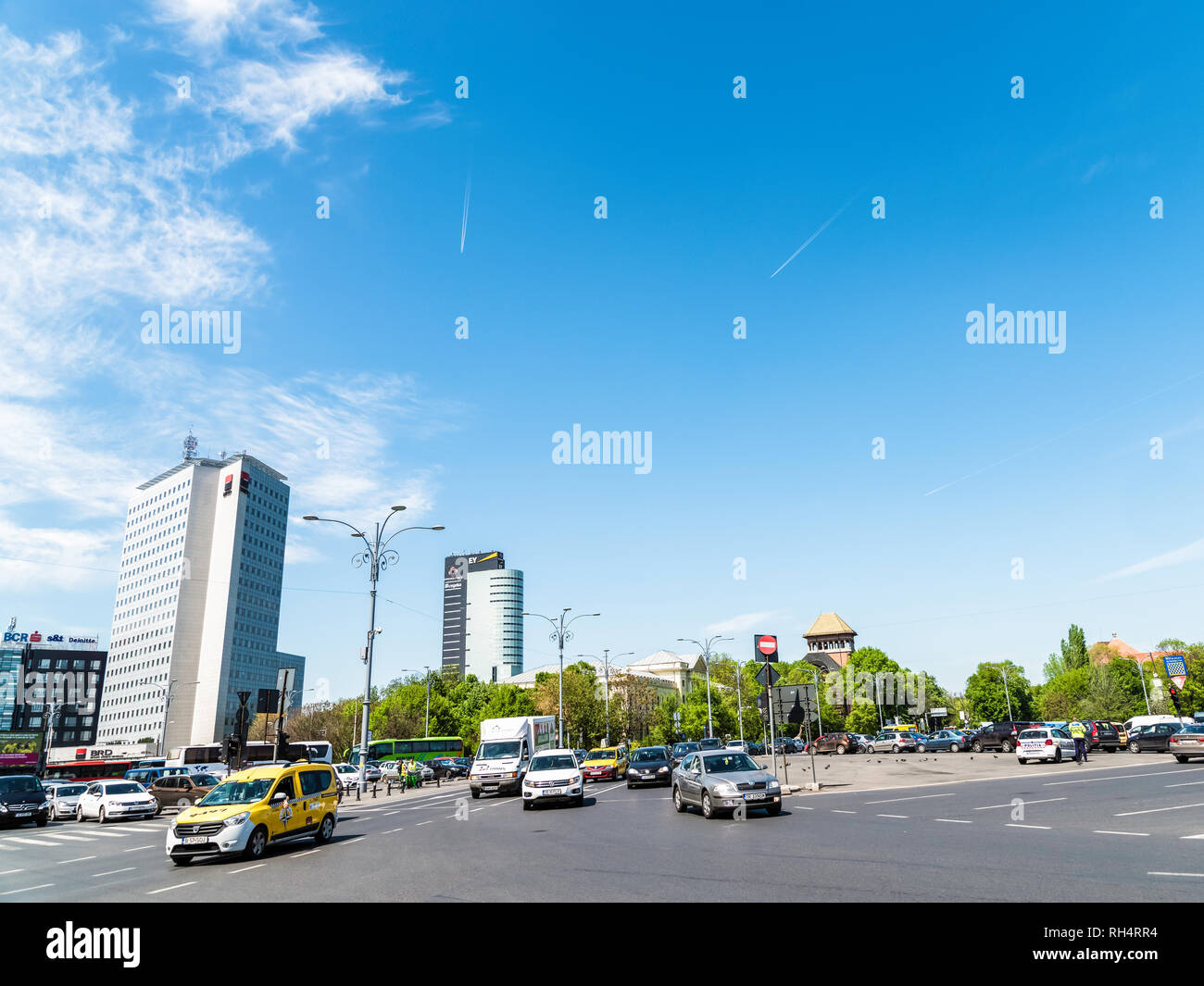 BUCHAREST, ROMANIA - APRIL 16, 2016: Rush Hour Traffic On Victory Square, Major Intersection In ...
