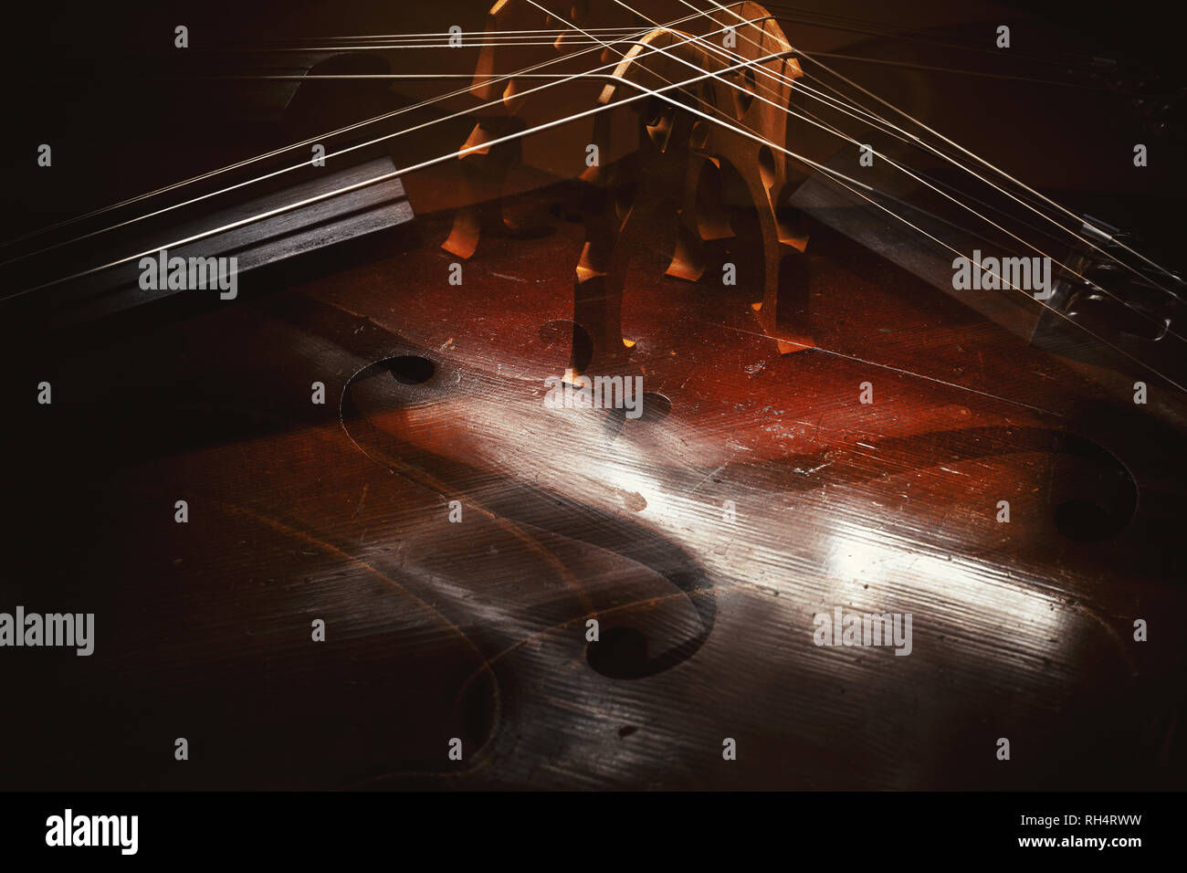 Abstract composition of an old cello parts, blended structure and wood ...